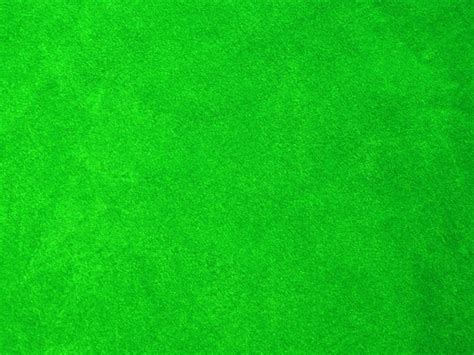 배경으로 사용되는 녹색 벨벳 패브릭 질감 부드럽고 매끄러운 섬유 소재의 빈 녹색 패브릭 배경 Textx9를 위한 공간이 있습니다 프리미엄 사진