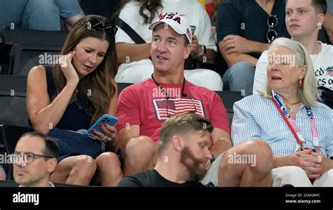 Peyton Manning Center Attends The Womens Artistic Gymnastics