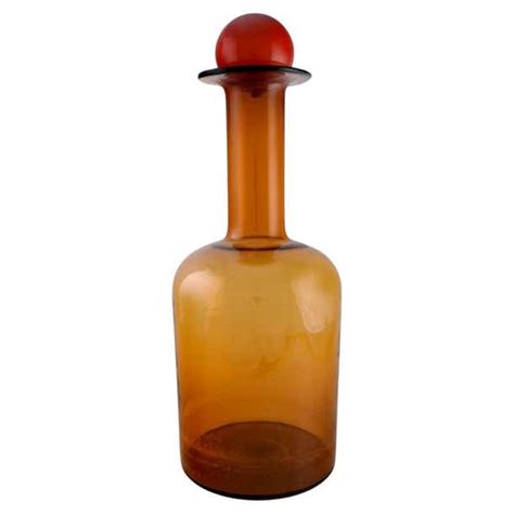 Otto Brauer For Holmegaard Colossal Bottle In Brown Art Glass With Red