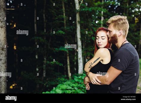 Guy Hugging His Girlfriend Stock Photo Alamy