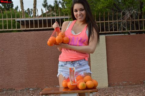 Hot Brunette Girl Selling Oranges On The Corner Of The Street 15 Photos