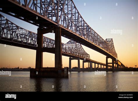 The Crescent City Connection Bridge Spans The Mississippi River At