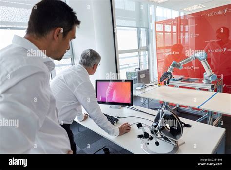 Robot Composed Of Two Pieces A Robotic Arm Motorized By A Clamp To Handle Dangerous Objects