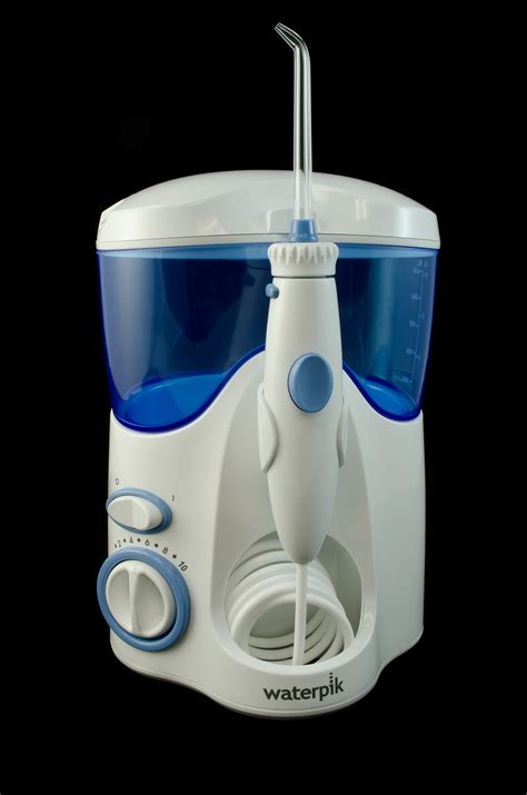 Sphere of Health: Oral Irrigators: Useful, but Not a Substitute for Floss