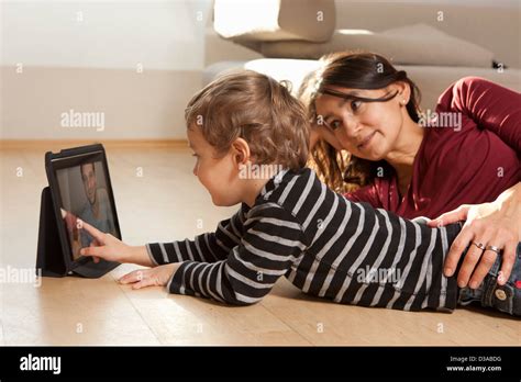 Mother And Son Video Chatting Stock Photo Alamy