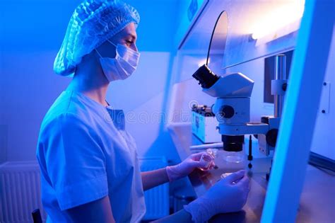 Serious Focused Female Scientist Is Working At Laboratory Stock Image