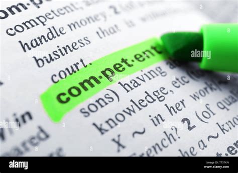Green Marker Highlighting Word In Dictionary Stock Photo Alamy