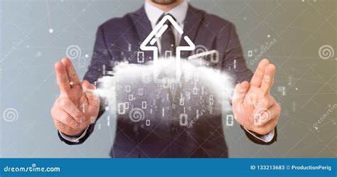 Businessman Holding A Binary Cloud With Upload Internet Arrow 3d