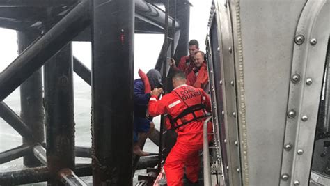 Brothers Clinging To Light In Tampa Bay Rescued By Coast Guard
