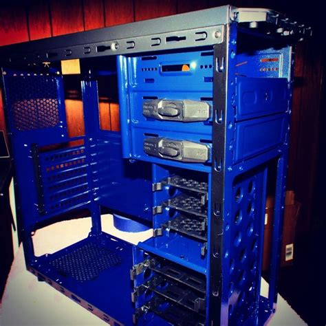 A Large Blue Computer Case Sitting On Top Of A Table