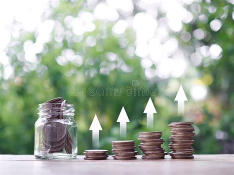 Stack Of Coins With Arrow Rising Icons The Concept Of Business Growth