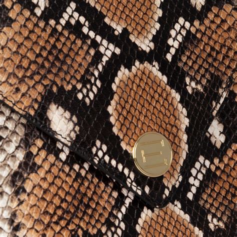 The Aerin Envelope Clutch Camel Python Edit By Elaine Turner