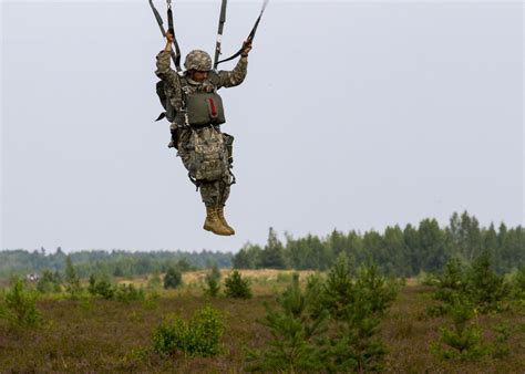 Military Paratrooper Landing