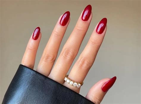 A Look At The Classic Red Nails History And Modern Designs