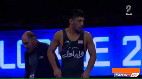 پیروزی 11 بر 1 رضا اطری در وزن 61 کیلوگرم کشتی آزاد قهرمانی جهان مقابل بصیر علی‌لی از مقدونیه