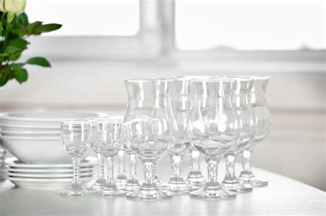 Premium Photo Clean Plates Glasses And Cutlery On White Table