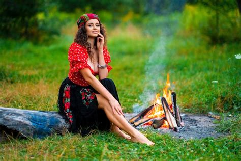 Premium Photo Pretty Brunette Curly Girl In Red Gipsy Costume And