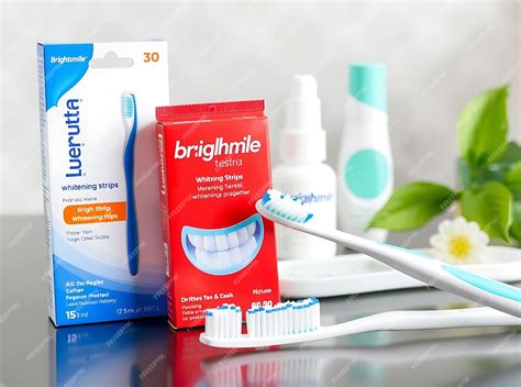 A Tube Of Light Blue And White Toothpaste Next To A Tube Of Toothpaste