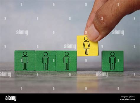 Hand Put Female Into The Male Team Create Gender Balance In The Company Gender Diversity