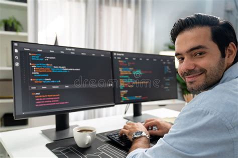 Smiling It Working Software Development Looking Camera On Two Pc