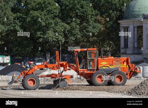 Nancy France Orange Motor Grader Cat 140h On Construction Site Stock