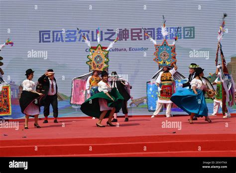 Ecuadorian Artisits Of Cuniburo Cultura Dressed Up In Dance Customes