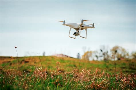 Premium Photo Close Up On White Drone Camera Drone Quadcopter In Flight