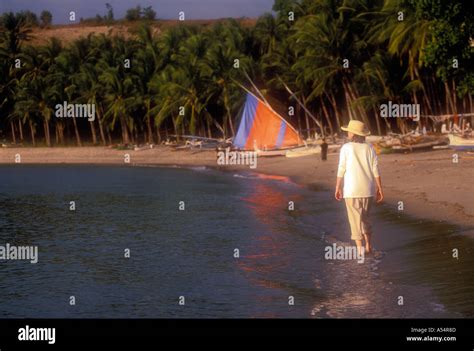 Woman Walking Along Pantai Nipah Beach On Lombok Island Indonesia Model