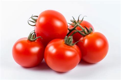 Premium Ai Image Tomatoes On A White Background Ai Generated