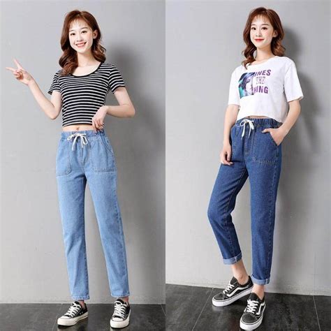 In Seoul แฟชั่นเกาหลี กางเกงยีนส์ขายาว ทรงบอย เอวเป็นสม๊อคเป็นยางยืด มีเชือกผูก แต่งกระเป๋า