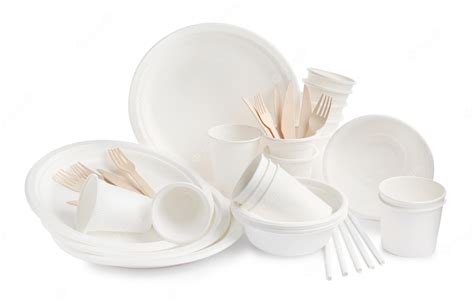 Premium Photo Set Of Disposable Tableware On White Background