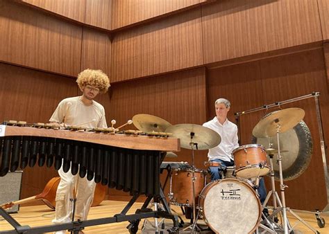 Dylan Bassett Capitalizes On Faculty Travel Award To Drum Up