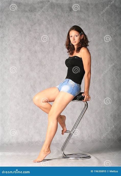 Cute Brunette Sitting Stock Image Image Of Jeans Alluring 19630893