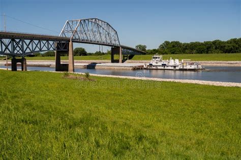 Barge Heading Up The Mississippi River Thru The Lock And Dam Canal Stock