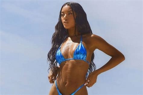 Model Hits The Beach In Jewelled G String And Flaunts Blinged Bum