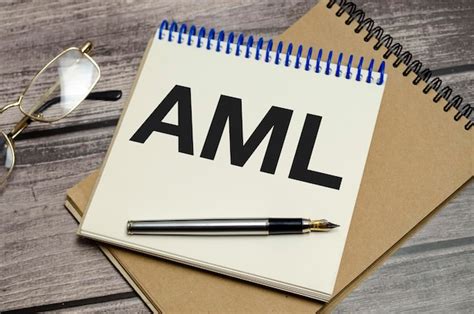 Premium Photo Aml Antimoney Laundering Words On Notepad And Wooden Background