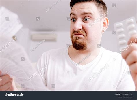 15 Confused Man Reading Drug Instruction Royalty Free Images Stock