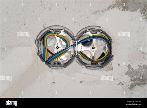 Boxes With Cables For Electric Sockets Installed In New House Building