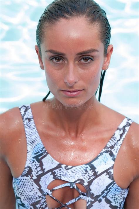 Woman In A One Piece Swimsuit At Poolside Stock Image Image Of