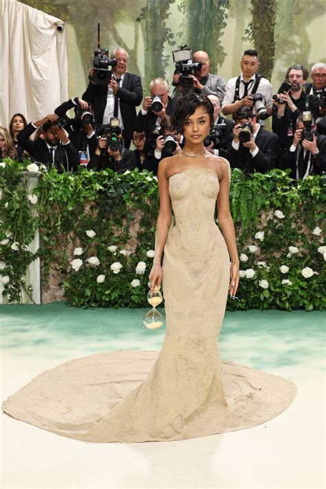 Tyla Needed Some Help Up The 2024 Met Gala Steps In Her Sculpted Sand Gown Fashionista