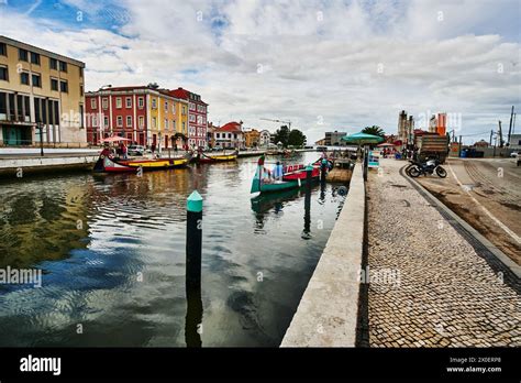 Traditional Moliceiro Boats On The Canals Of Aveiro Portugal Stock