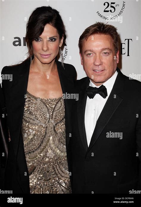 Sandra Bullock And Kevin Huvane The Amfar Inspiration Gala Held At The Chateau Marmont Los