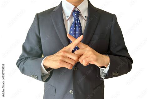 指でバツを作るスーツの男性 Foto De Stock Adobe Stock