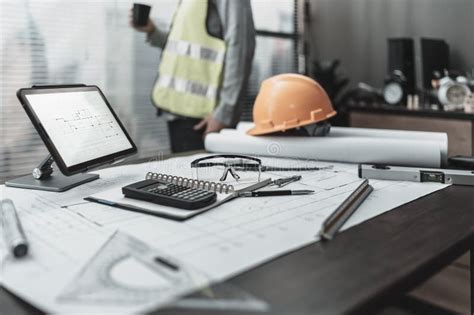 Calculator Triangle Ruler Safety Glasses Compass Vernier Caliper On Blueprint Engineer