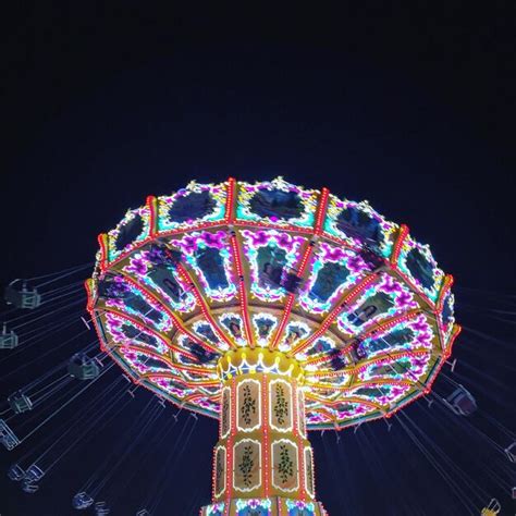 Premium Photo Low Angle View Of Illuminated Ferris Wheel Against Sky