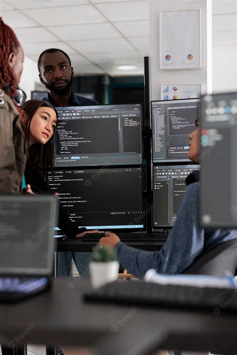 premium photo multi ethnic engineers analyzing server code and