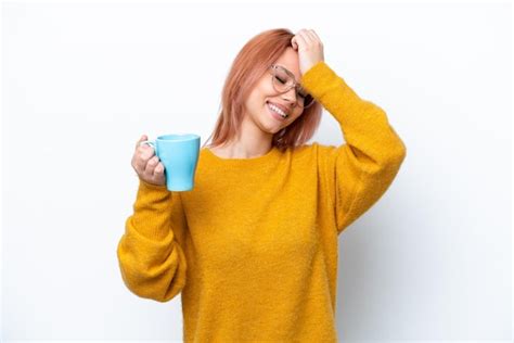 Premium Photo Young Russian Girl Holding Cup Of Coffee Isolated On