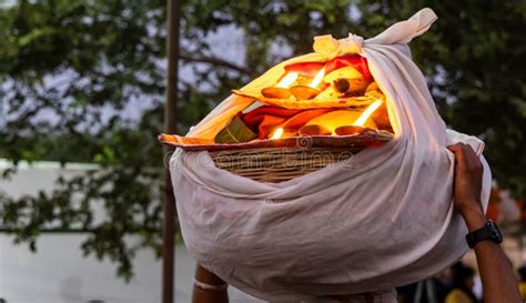 Holy Offerings Of Burning Clay Oil Lamp For Hindu Sun God At Chhath