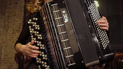 Fingers Of Woman Push Buttons On Accordion During Stock Footage Video