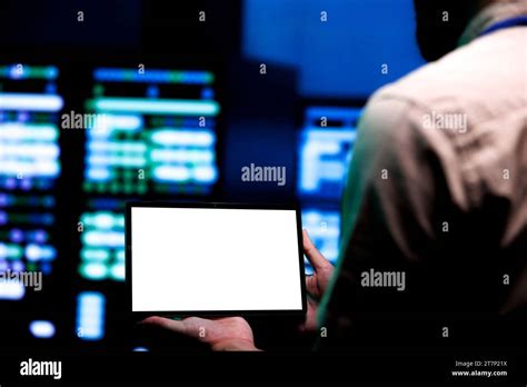 Adept Repairman Conducting Routine Auditing Of Data Center Server Racks Using Mock Up Tablet To